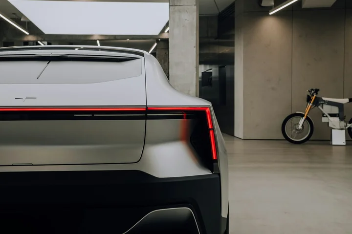 Sleek modern electric vehicle (EV) with futuristic LED taillights ...